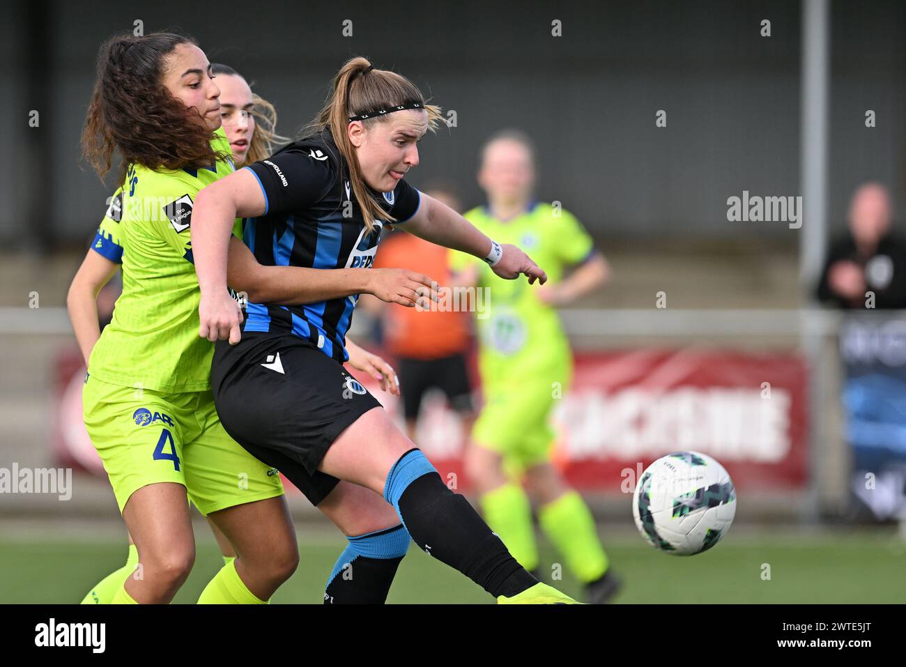 Aalter, Belgium. 16th Mar, 2024. Nia Elyn (4) of AA Gent pictured defending on Davinia ...