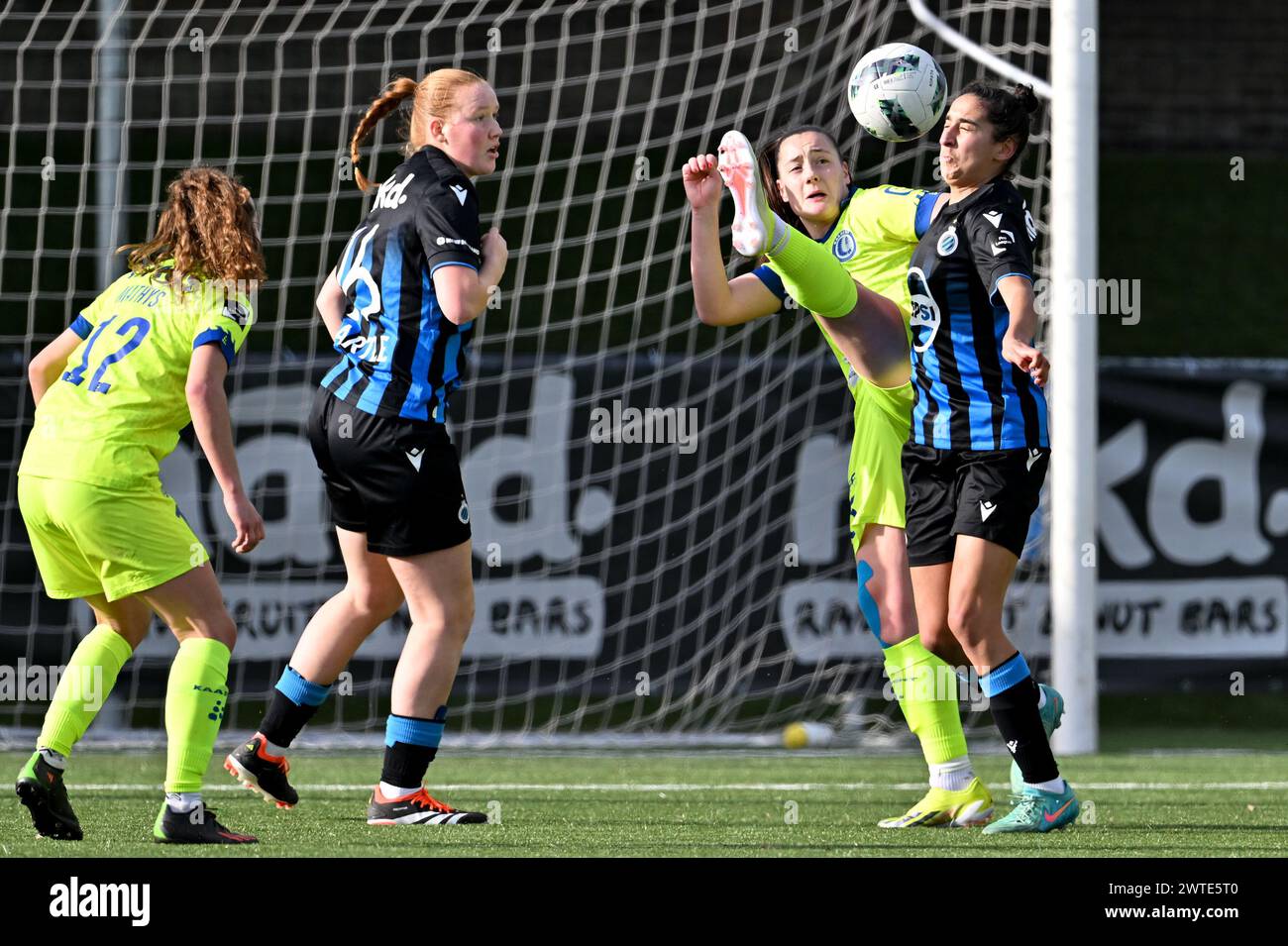 Aalter, Belgium. 16th Mar, 2024. Margaux Martle (16) of Club YLA, Ines Van Gansbeke (15) of AA ...