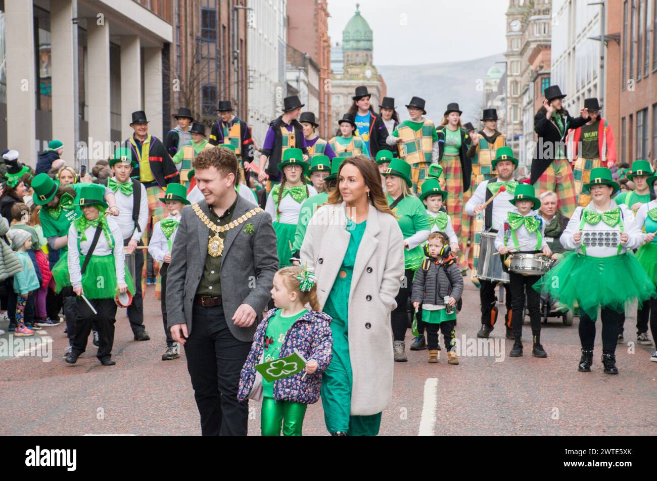 Belfast, Northern Ireland. 17th Mar, 2024. Crowds wearing colourful ...
