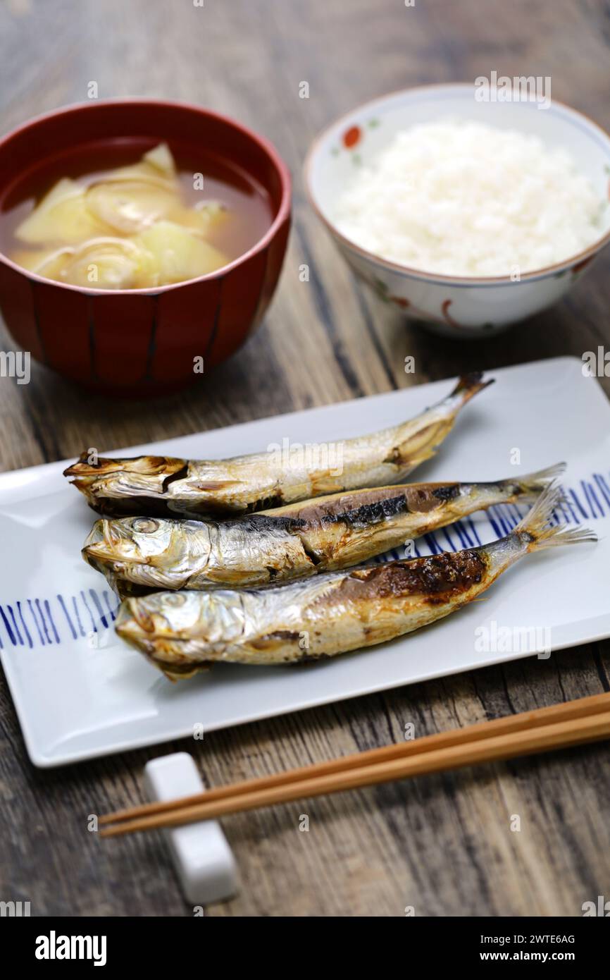 traditional Japanese breakfast set meal; grilled fish, rice, and miso ...