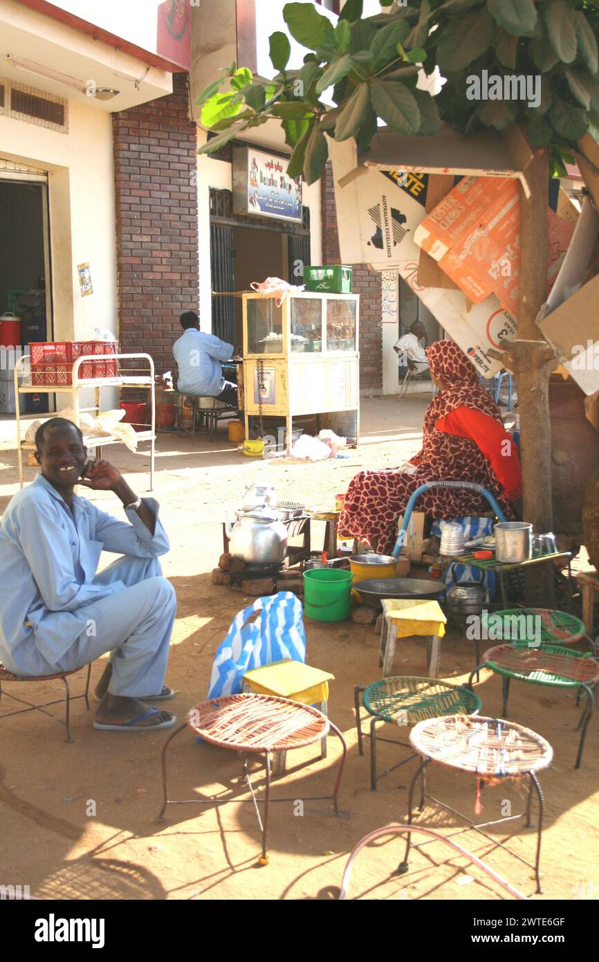 Roadside coffee-seller with customer, Khartoum, Sudan Stock Photo - Alamy