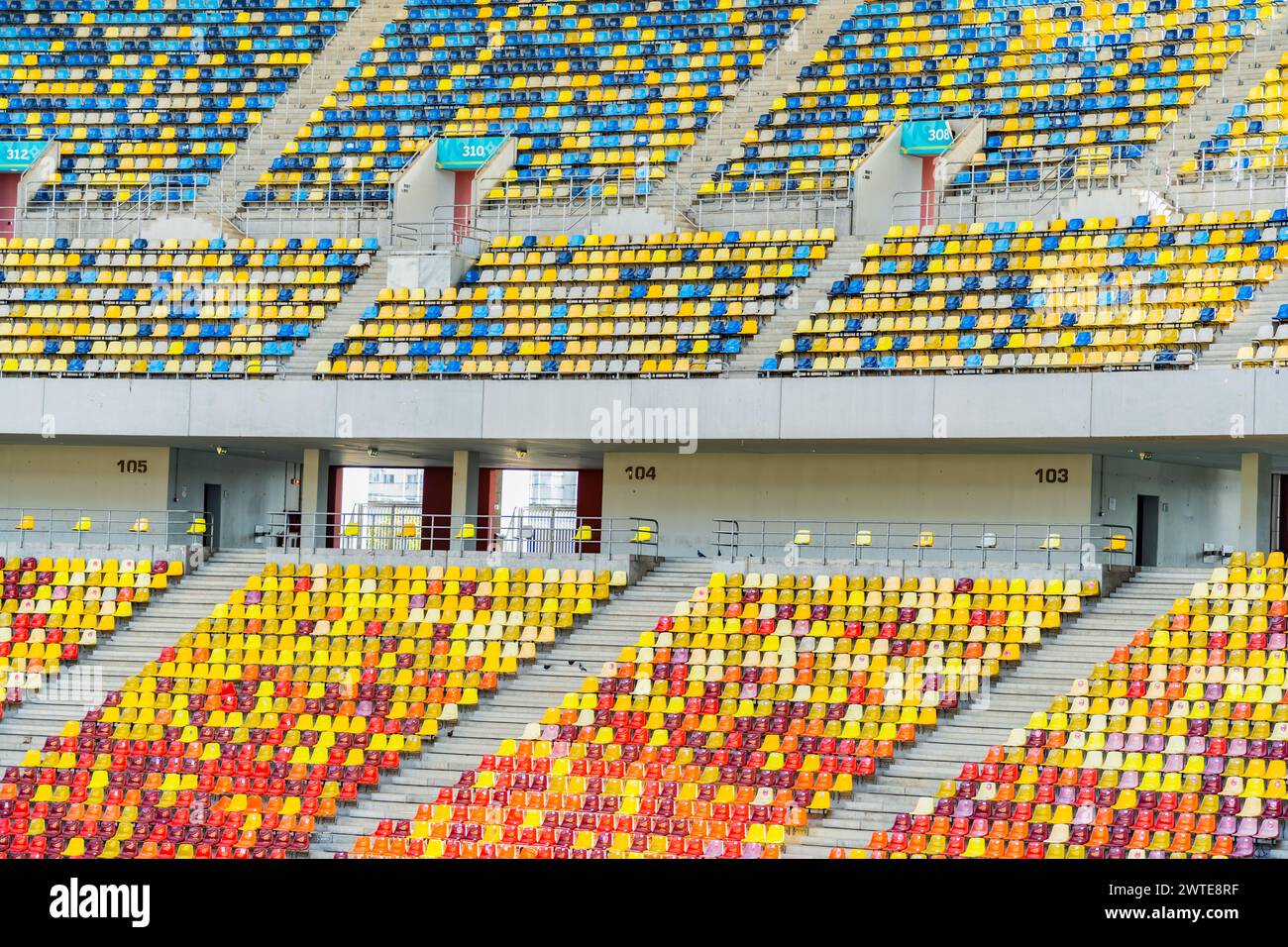 Colorful seats in an empty stadium arena. Close up detail Stock Photo ...