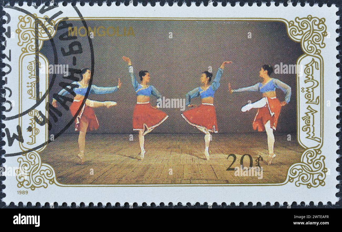 Cancelled postage stamp printed by Mongolia, that shows Dancers in ...