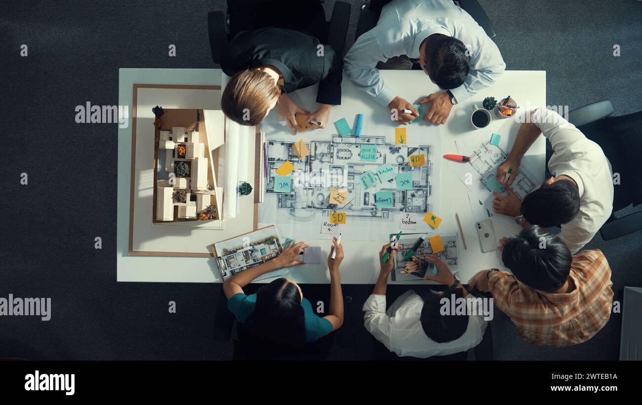 Top aerial view of project manager or civil engineer writing at ...