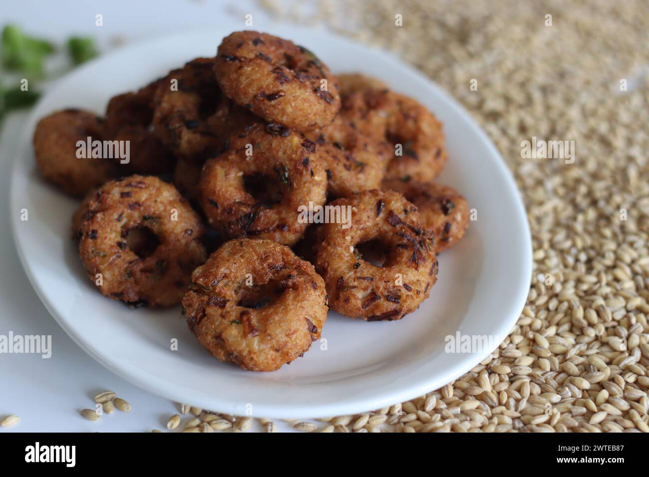 Barley Vada or fritters. Golden fried hulled barley vadas, crispy ...