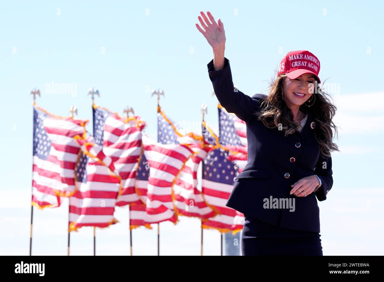 South Dakota Gov. Kristi Noem gestures to the crowd prior to remarks ...
