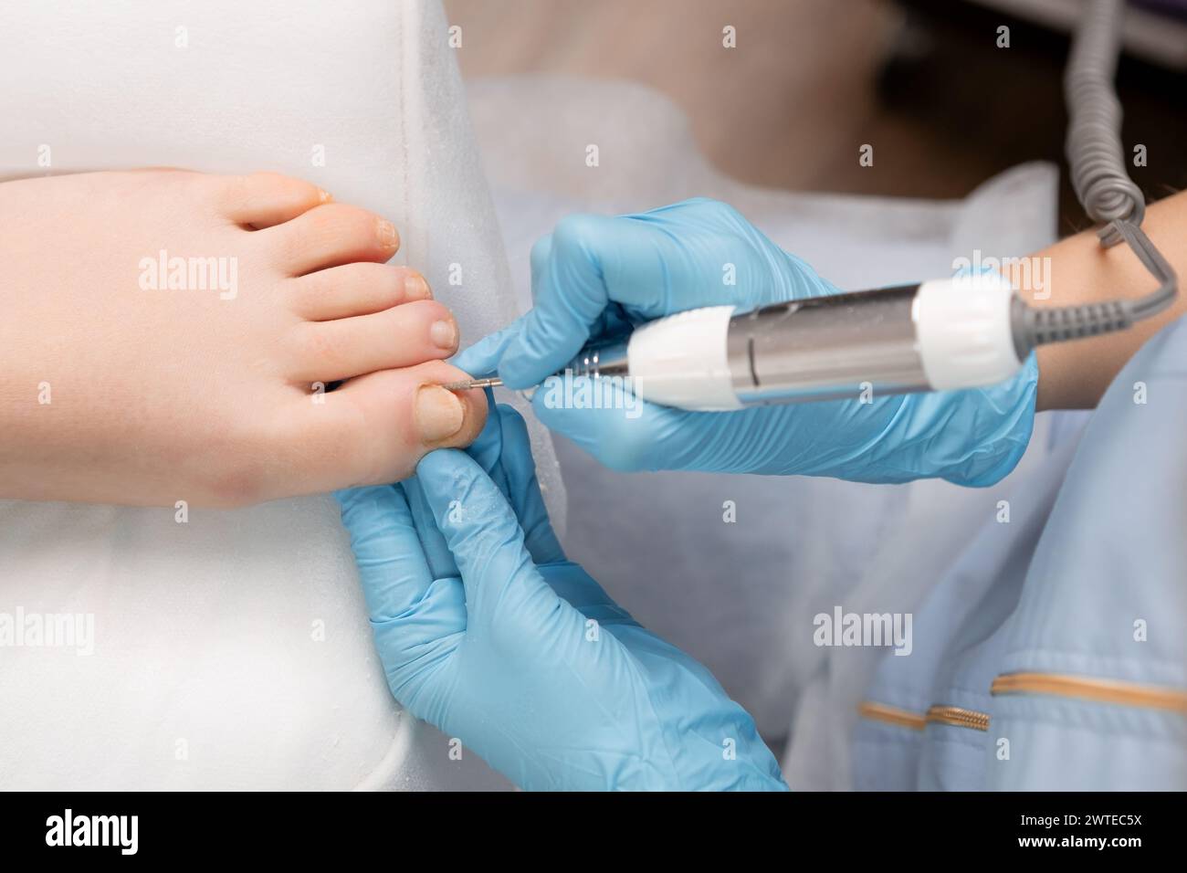 Professional hardware pedicure using electric drill machine by pedicure ...