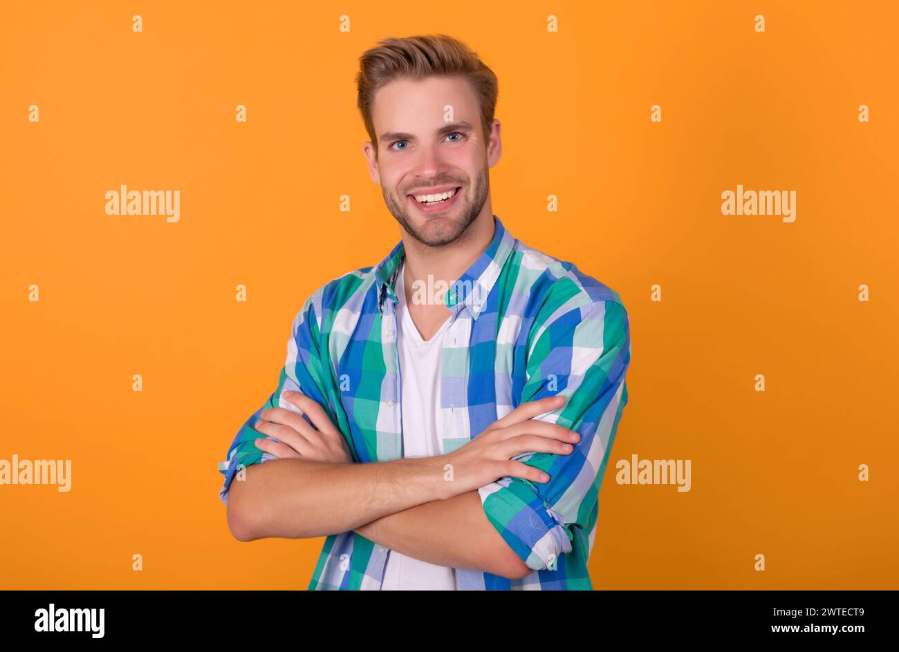 Confident smile. Confident guy portrait yellow background. Smiling ...