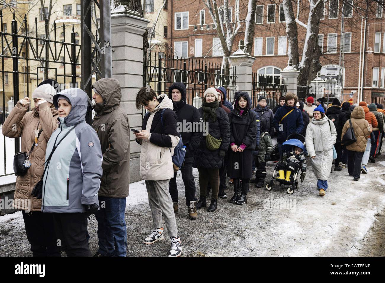 People queue to vote, outside the Russian Embassy in Helsinki, Finland ...