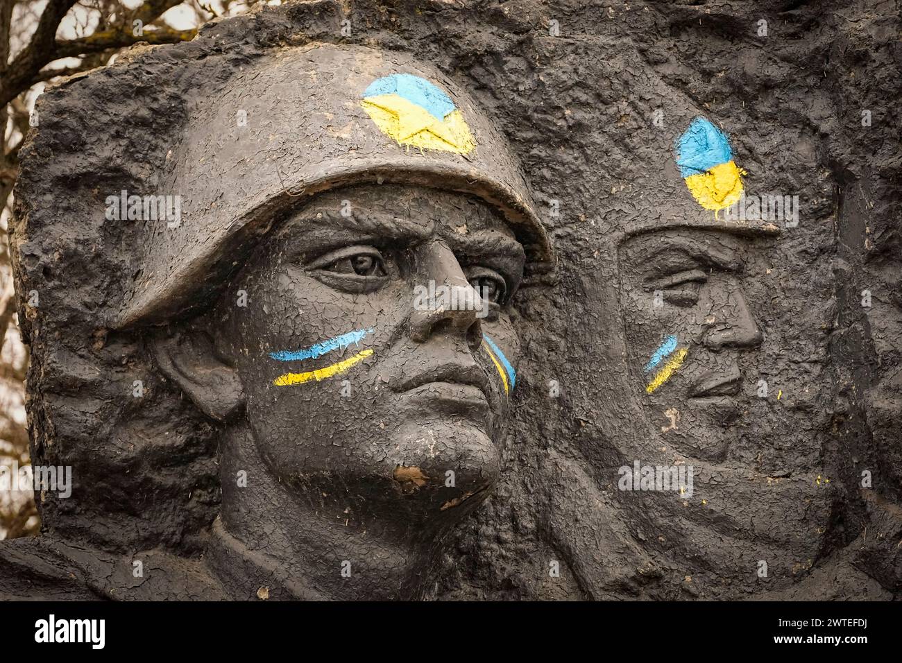 A Soviet-era WWII monument is painted with yellow and blue, Ukrainian ...