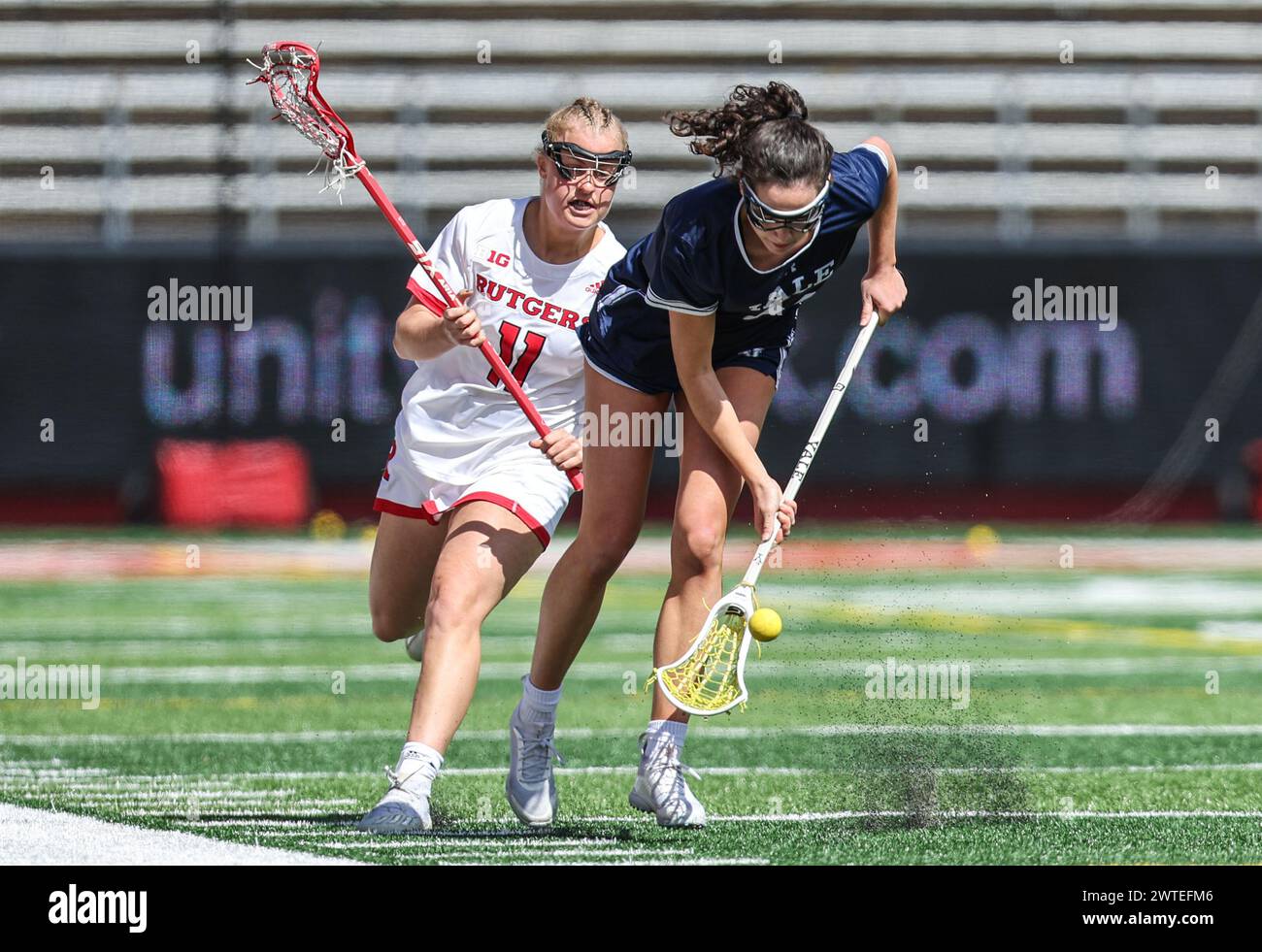 Piscataway, NJ, USA. 17th Mar, 2024. Rutgers attack Lily Dixon (11) and ...