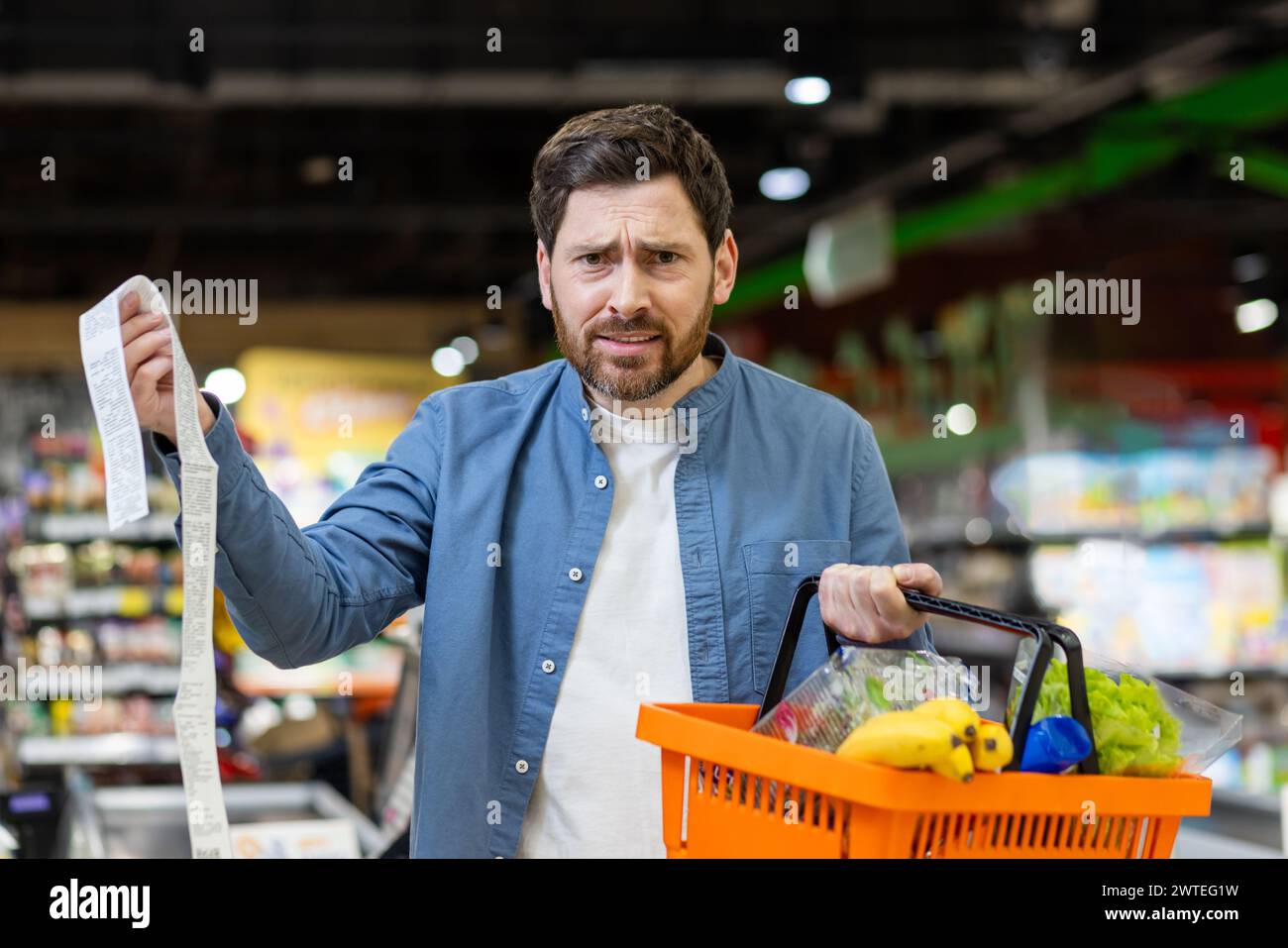 Supermarket receipt person basket hi-res stock photography and images ...