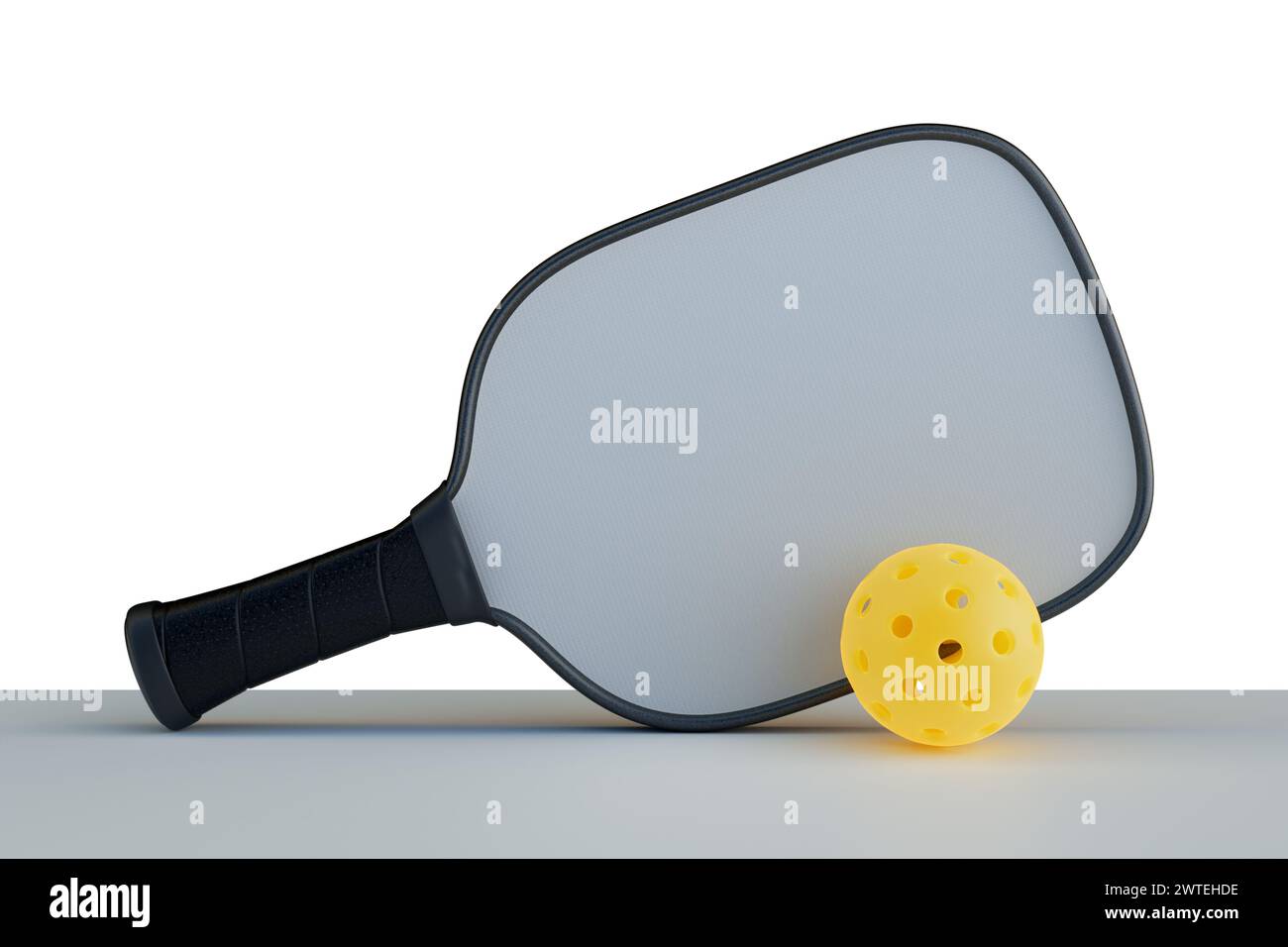 Pickleball paddle racket and ball lie on the table on an isolated ...