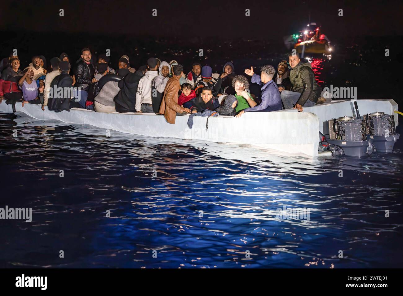 Libyan Sar Zone, Libya. 16th Mar, 2024. Migrants seen on a fiberglass ...