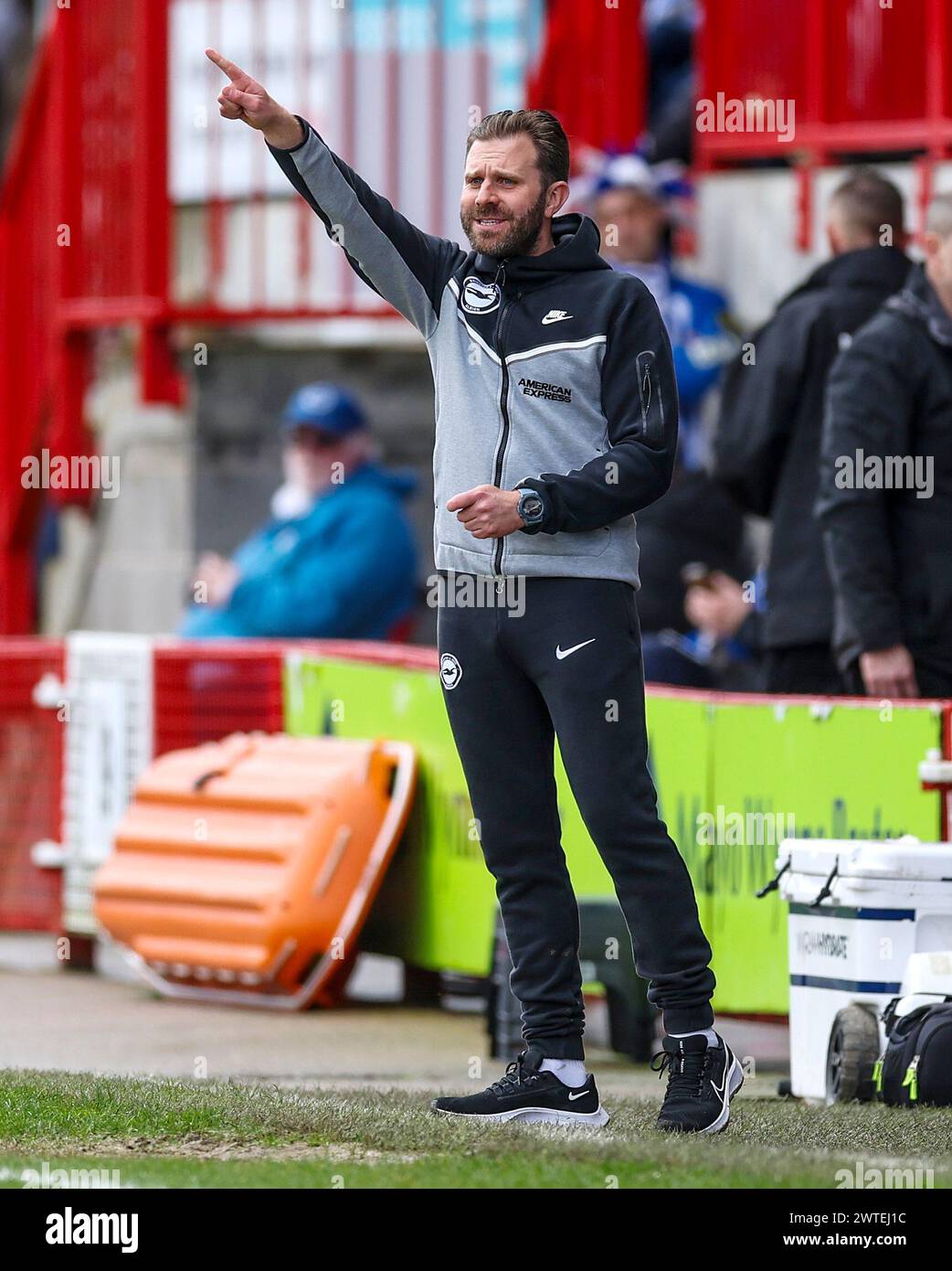Brighton and Hove Albion interim manager Mikey Harris gestures on the ...