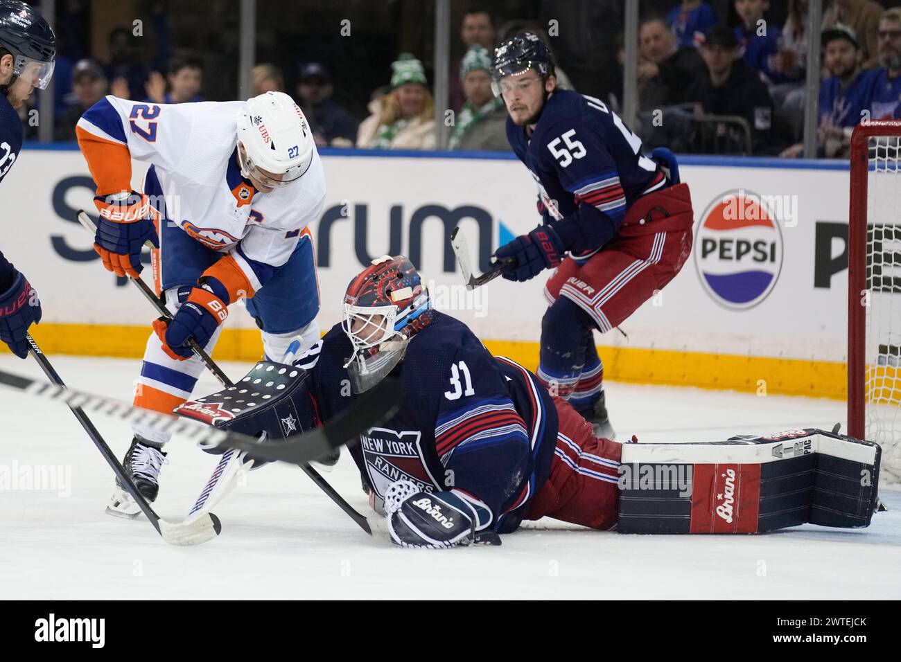 New York Rangers goaltender Igor Shesterkin (31) defends the goal from ...