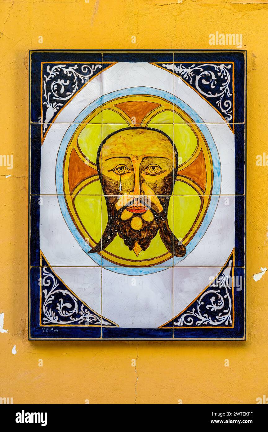 Religious saint on a tile painting art, Alicante, Spain Stock Photo - Alamy