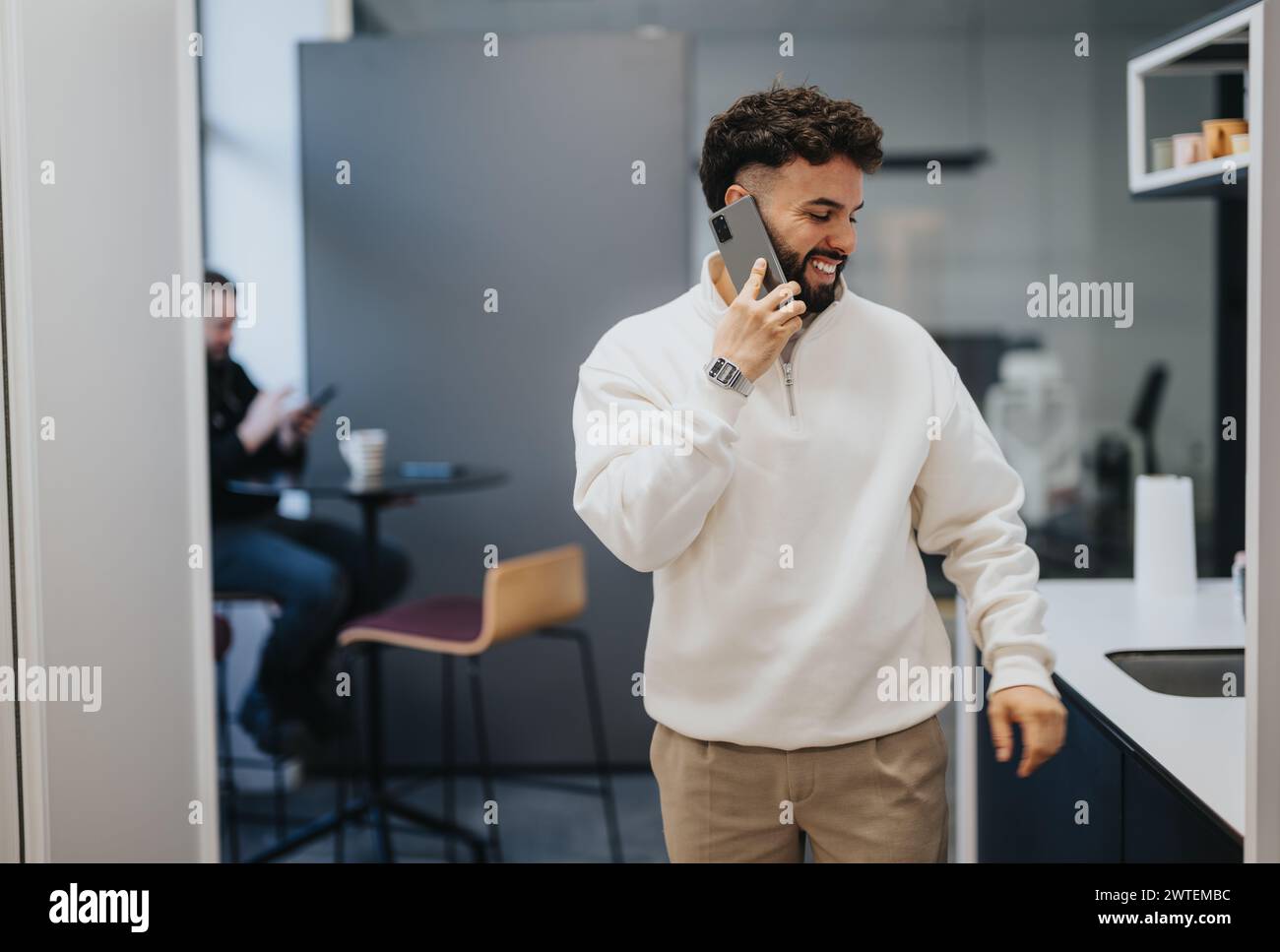 Stylish man preparing morning coffee in modern kitchen before work ...