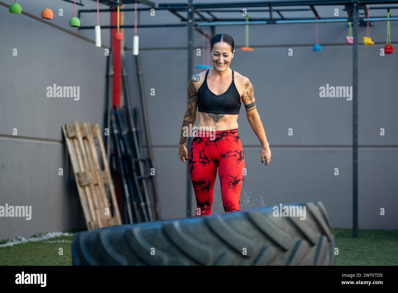 Happy strong woman proud while working out in the gym Stock Photo - Alamy