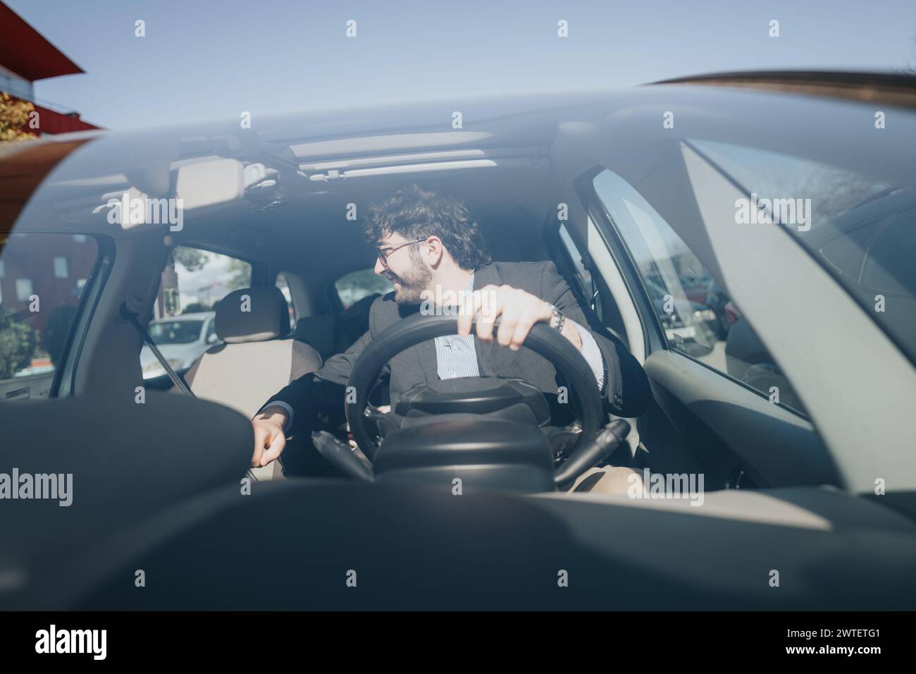 Professional businessman driving to work, corporate lifestyle concept ...