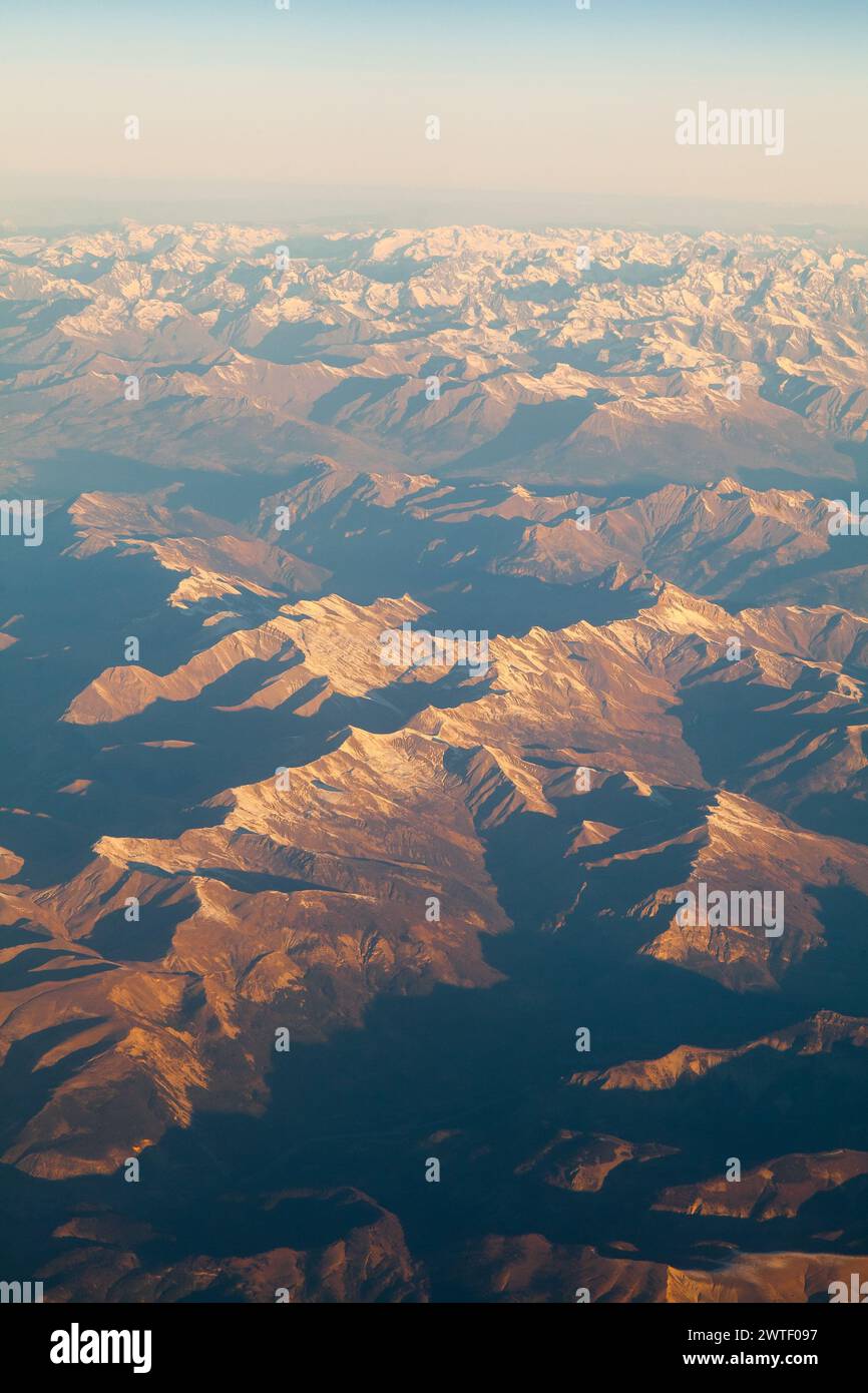 Southern Alps mountains during the sunset, view from airplane Stock ...