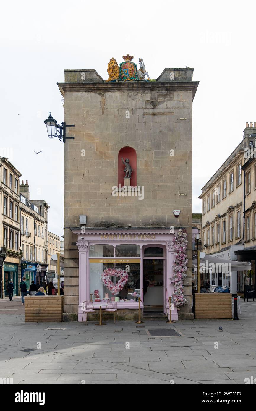 Charming facade of a pink flower shop with classic architectural ...