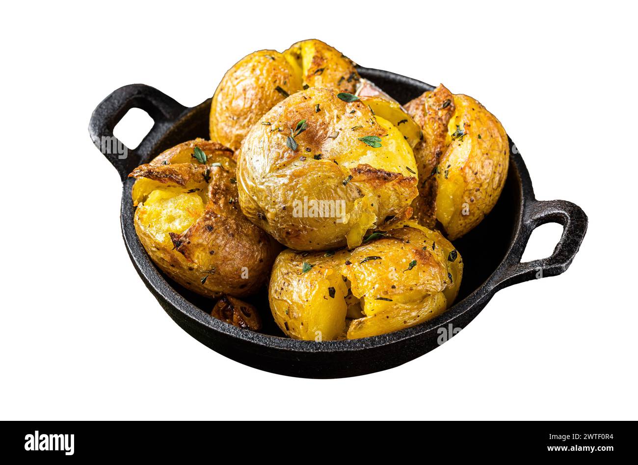 Crushed, Broken potatoes baked in oil with herbs. Isolated on white ...