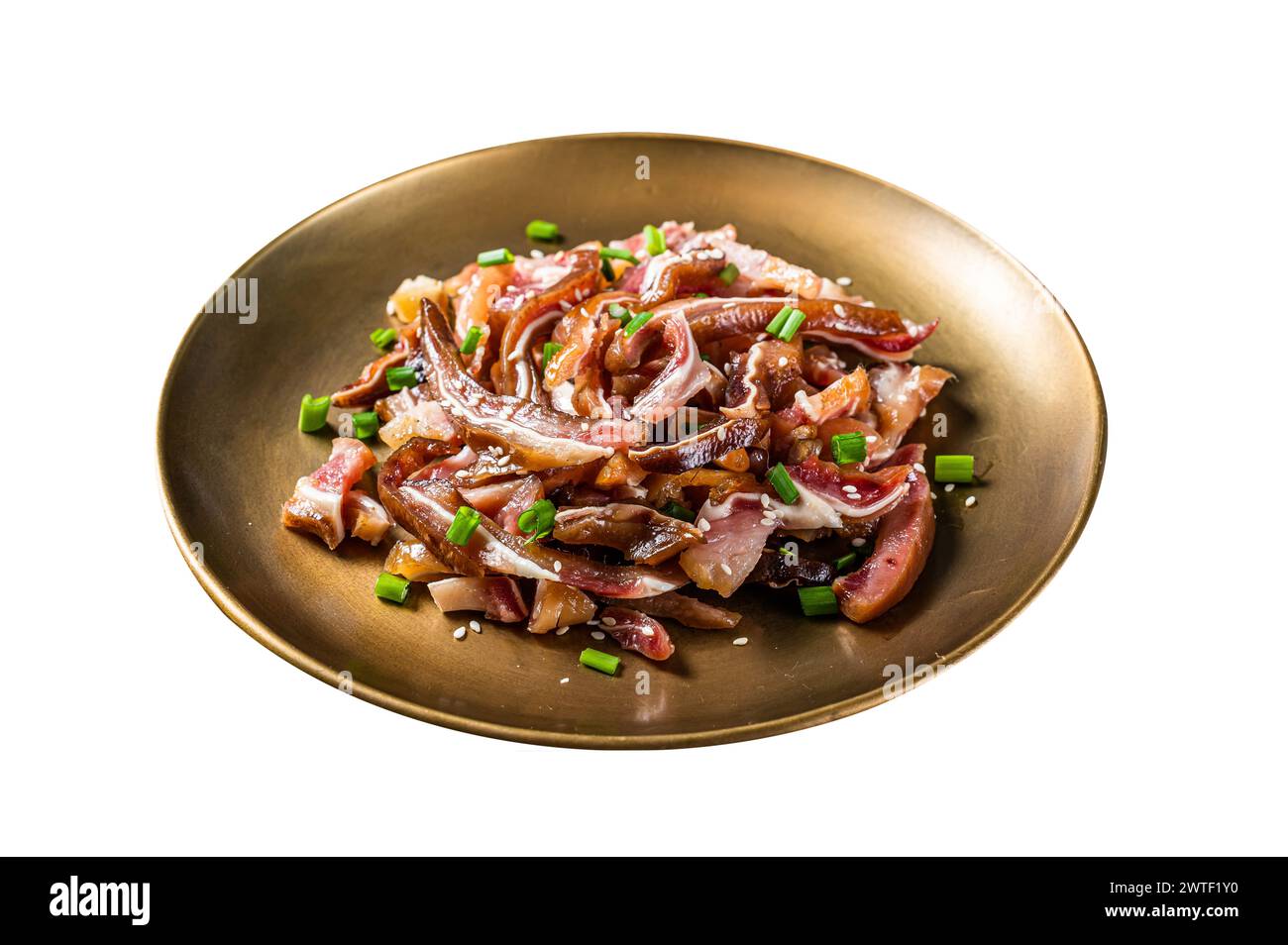 Asian appetizer pig pork ears with sesame seeds, green onion and spicy ...