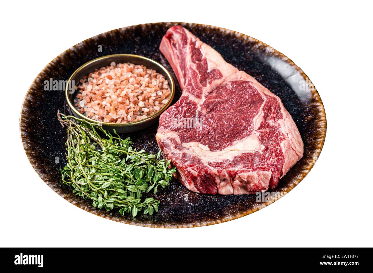 Raw prime cowboy or rib eye steak, dry aged beef meat. Isolated on ...