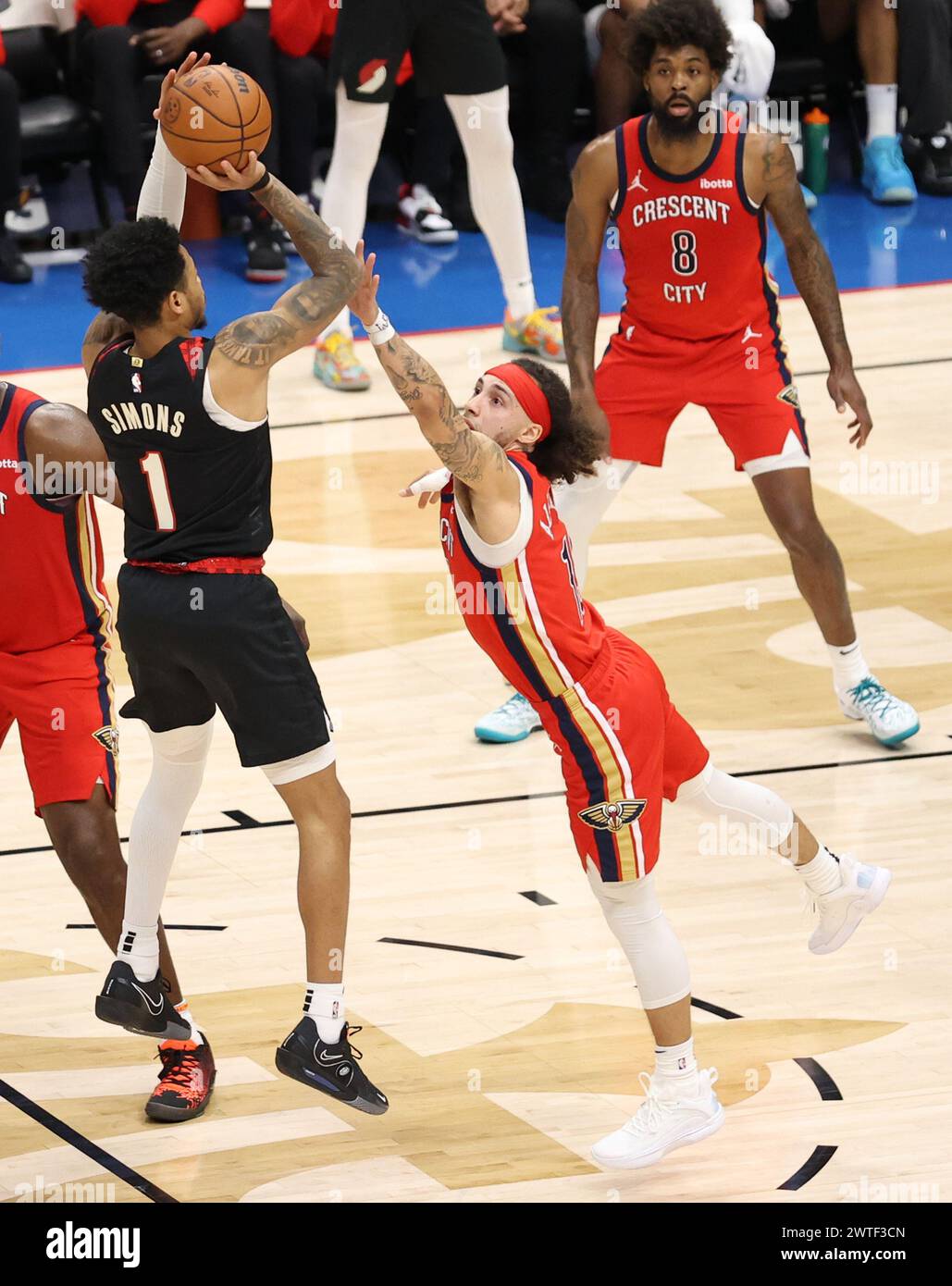 New Orleans, USA. 16th Mar, 2024. Portland Trail Blazers guard Anfernee Simons (1) shoots a ...