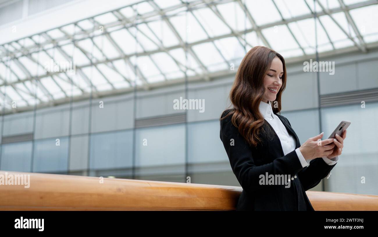 Young happy professional business woman employee Stock Photo - Alamy