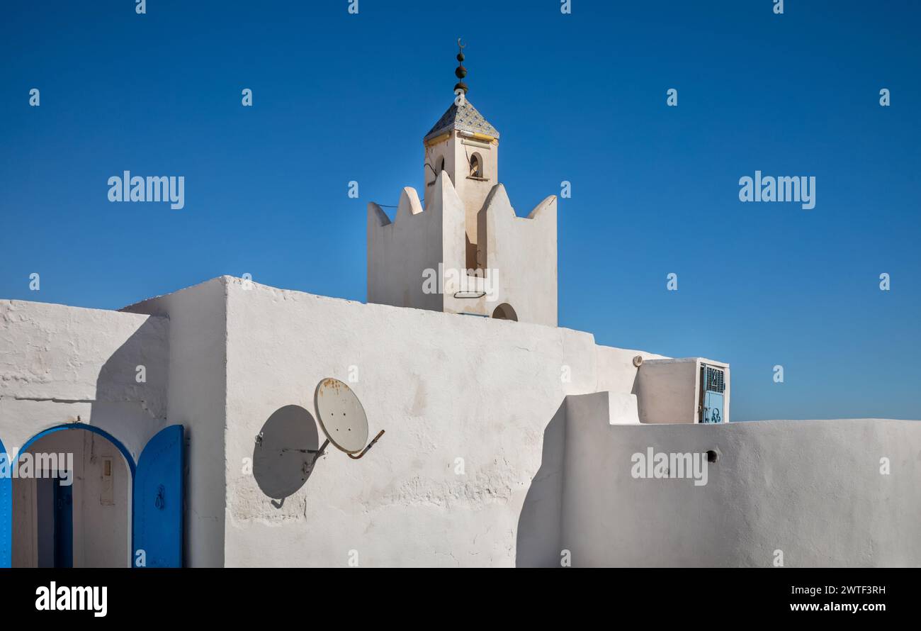 The white and blue mosque in the ancient Berber hilltop Takrouna ...