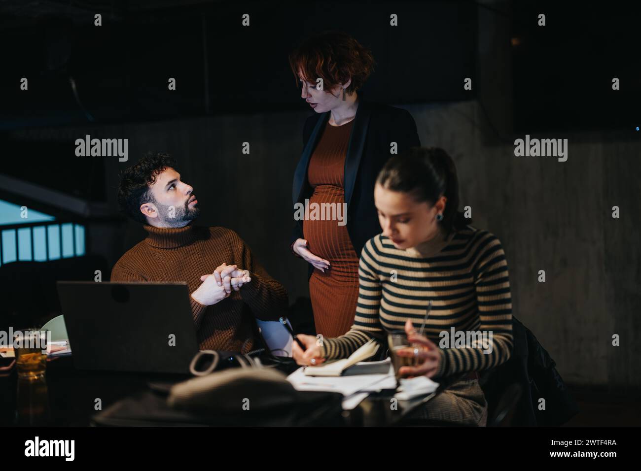 Successful business team analyzing sales statistics in corporate office ...