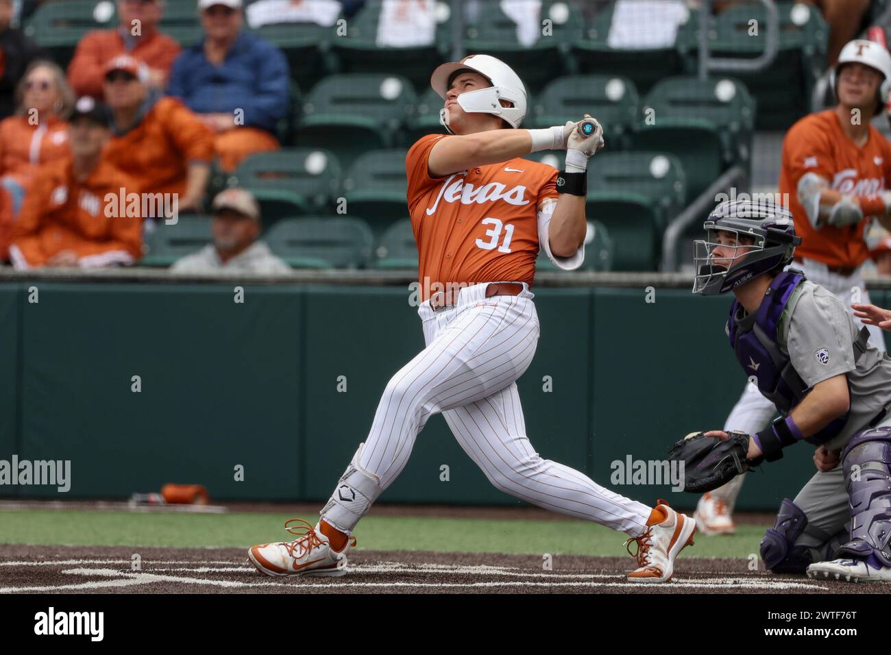 AUSTIN, TX - MARCH 17: Texas infielder Casey Borba (31) hits a fly ball ...