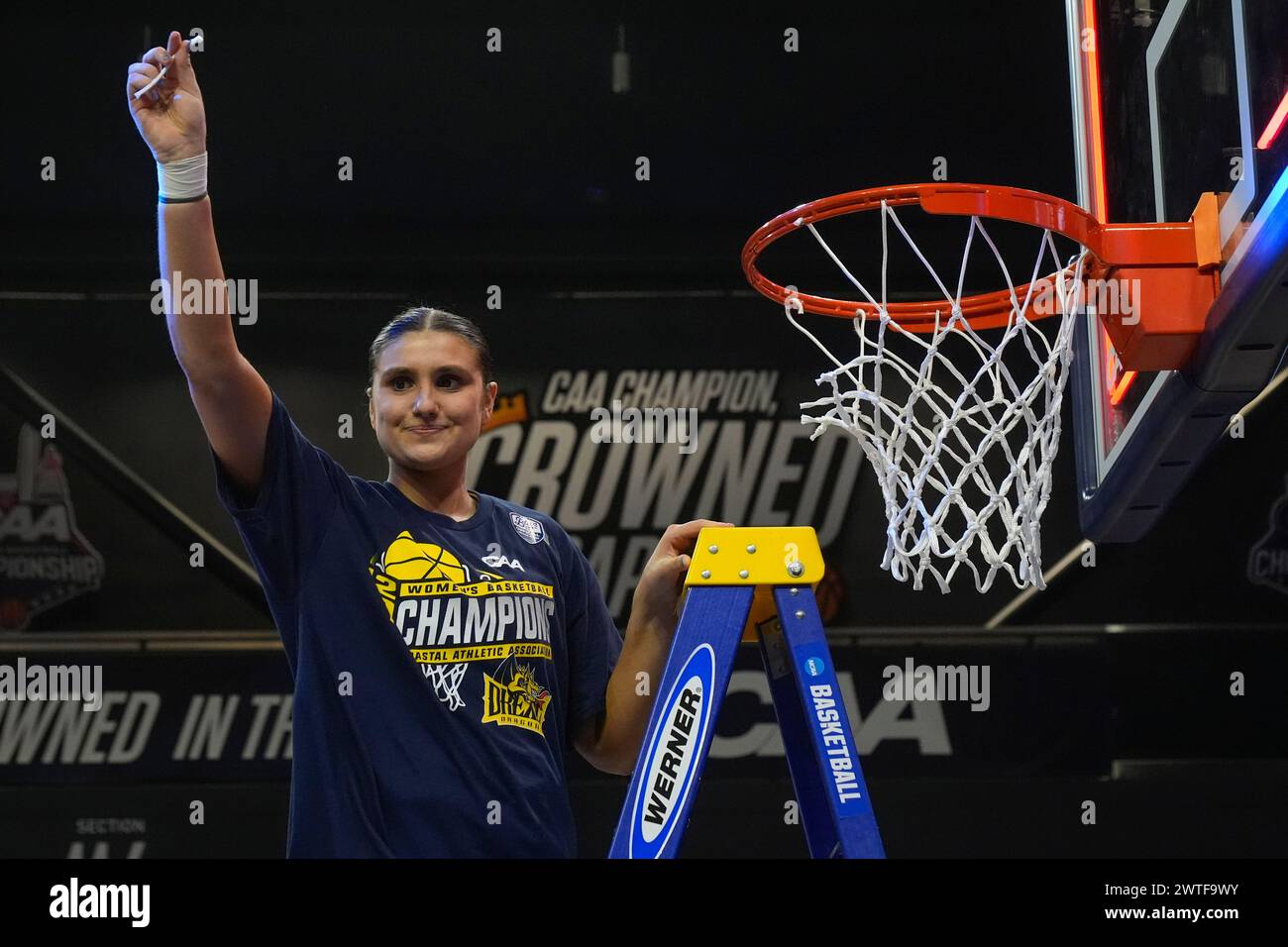 Drexel forward Chloe Hodges cuts down the net after their win in an ...