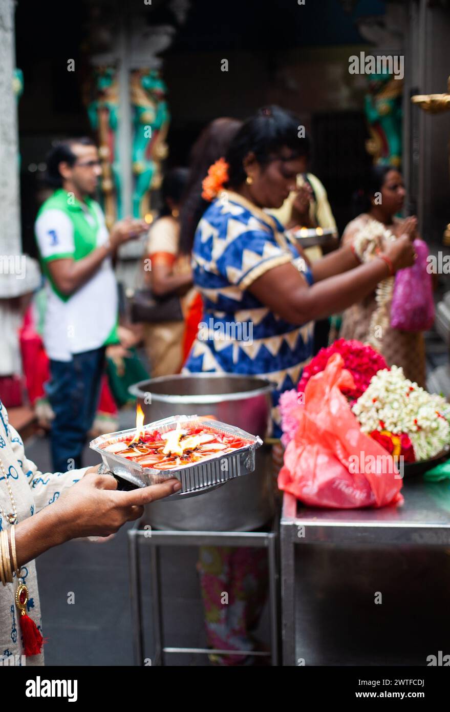 worshippers praying in Hindu temple Stock Photo - Alamy