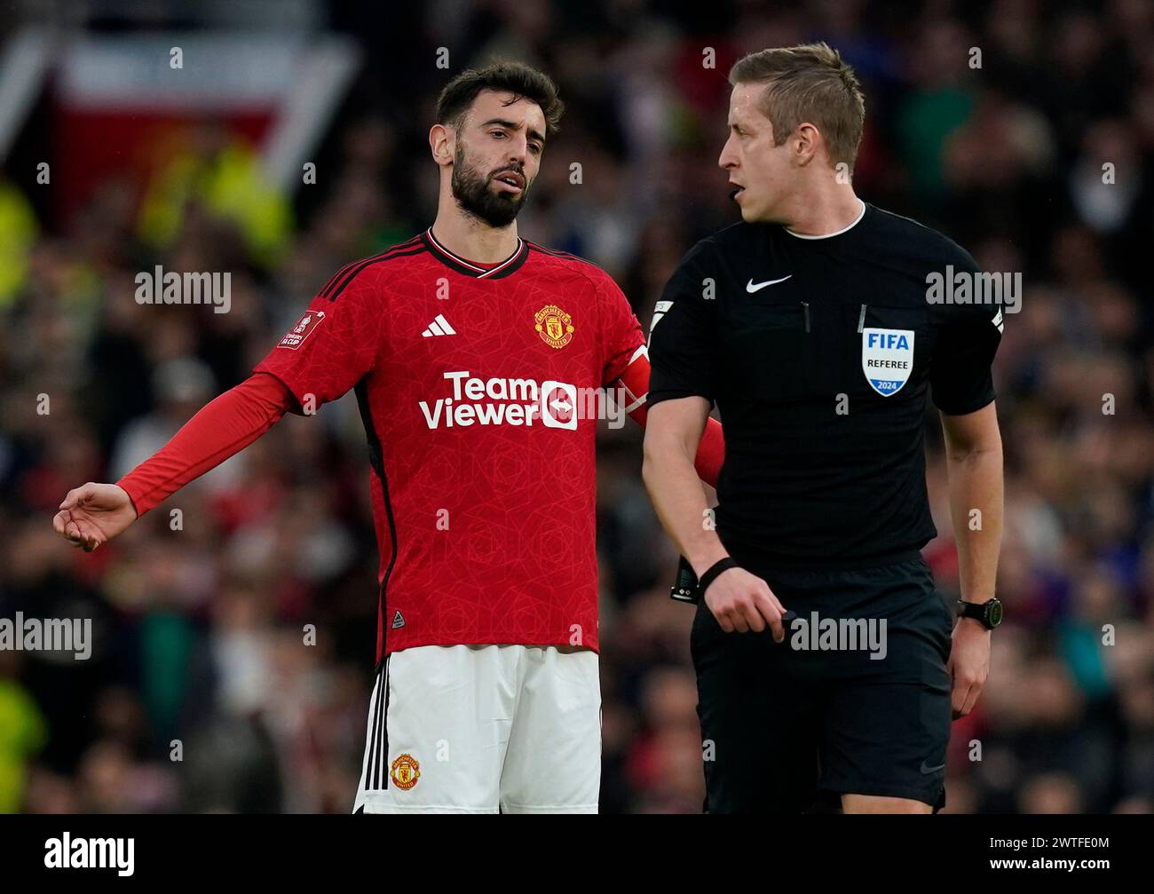 Manchester, UK. 17th Mar, 2024. Bruno Fernandes of Manchester United complains to referee John ...