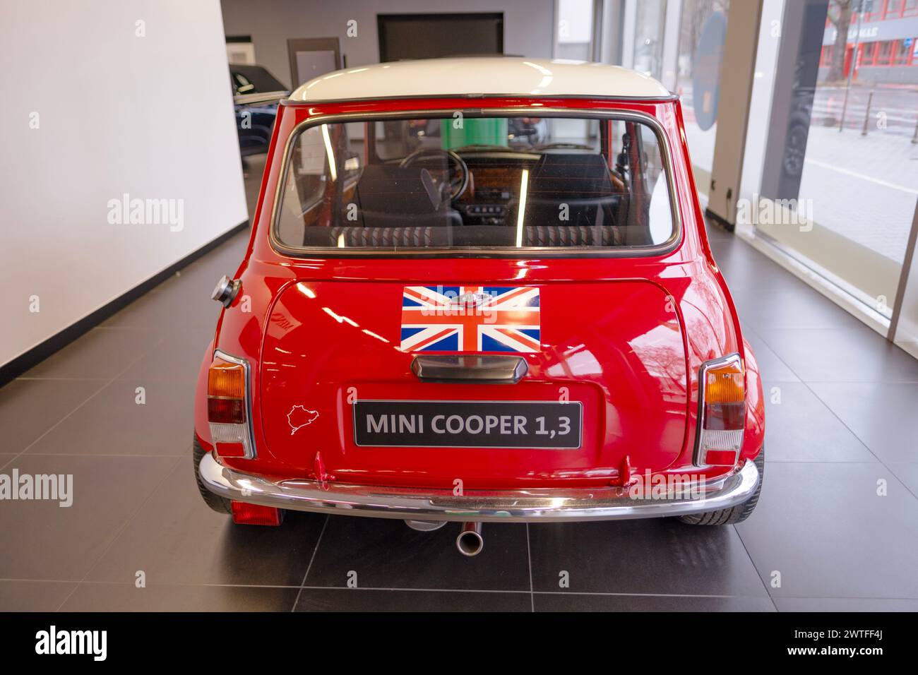 vintage Red Classic Rover MINI Cooper 1.3 Oldtimer in showroom, iconic ...