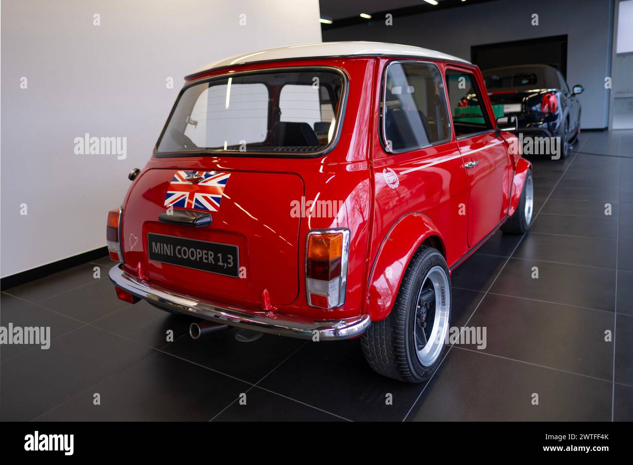 vintage Red Classic Rover MINI Cooper 1.3 Oldtimer in showroom, iconic ...