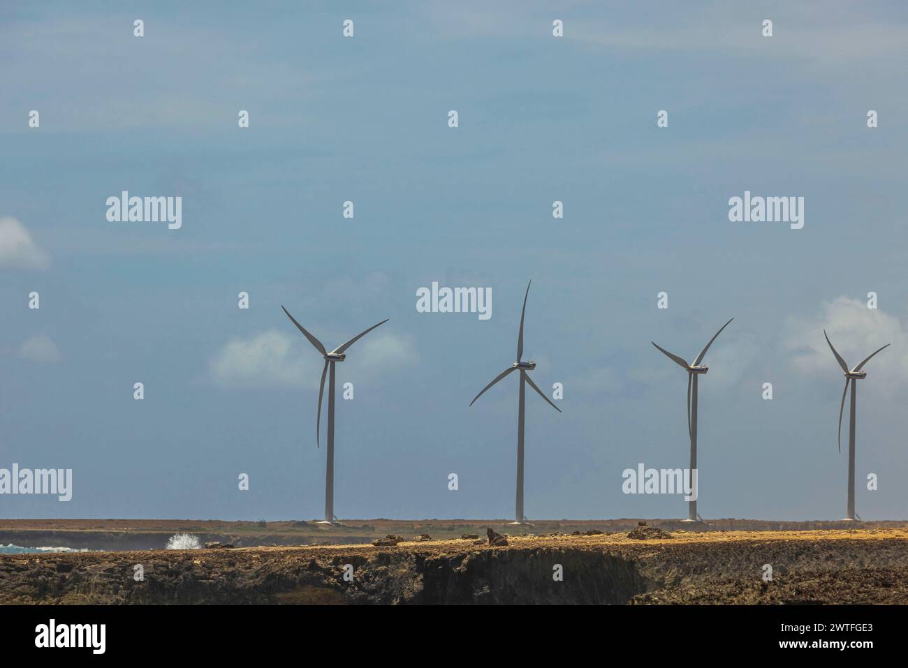 Sight of wind turbines in the desert along the Caribbean coast under a ...