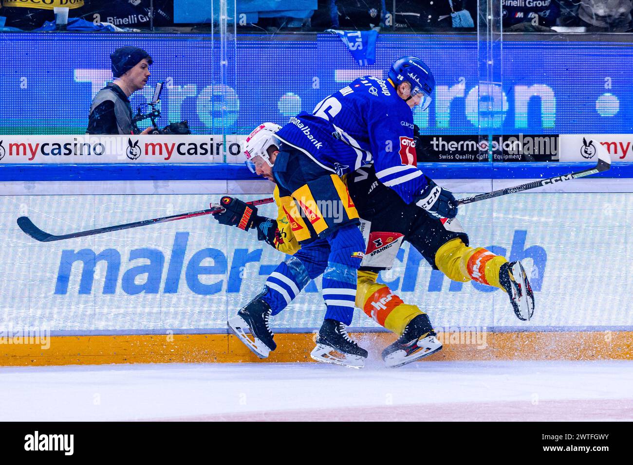 Check by Reto Suri #26 (EV Zug) during the National League Playoff ...