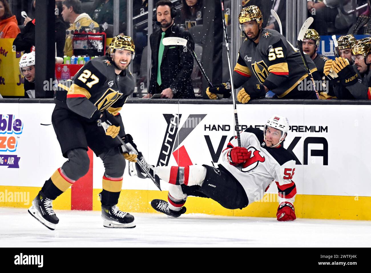 New Jersey Devils left wing Erik Haula (56) falls to the ice as Vegas ...
