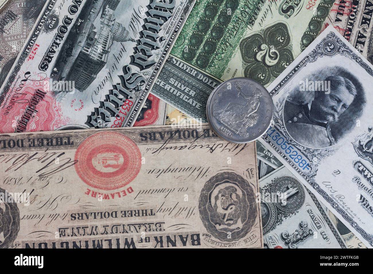 Old west period US banknotes and silver certificates with silver dollar ...