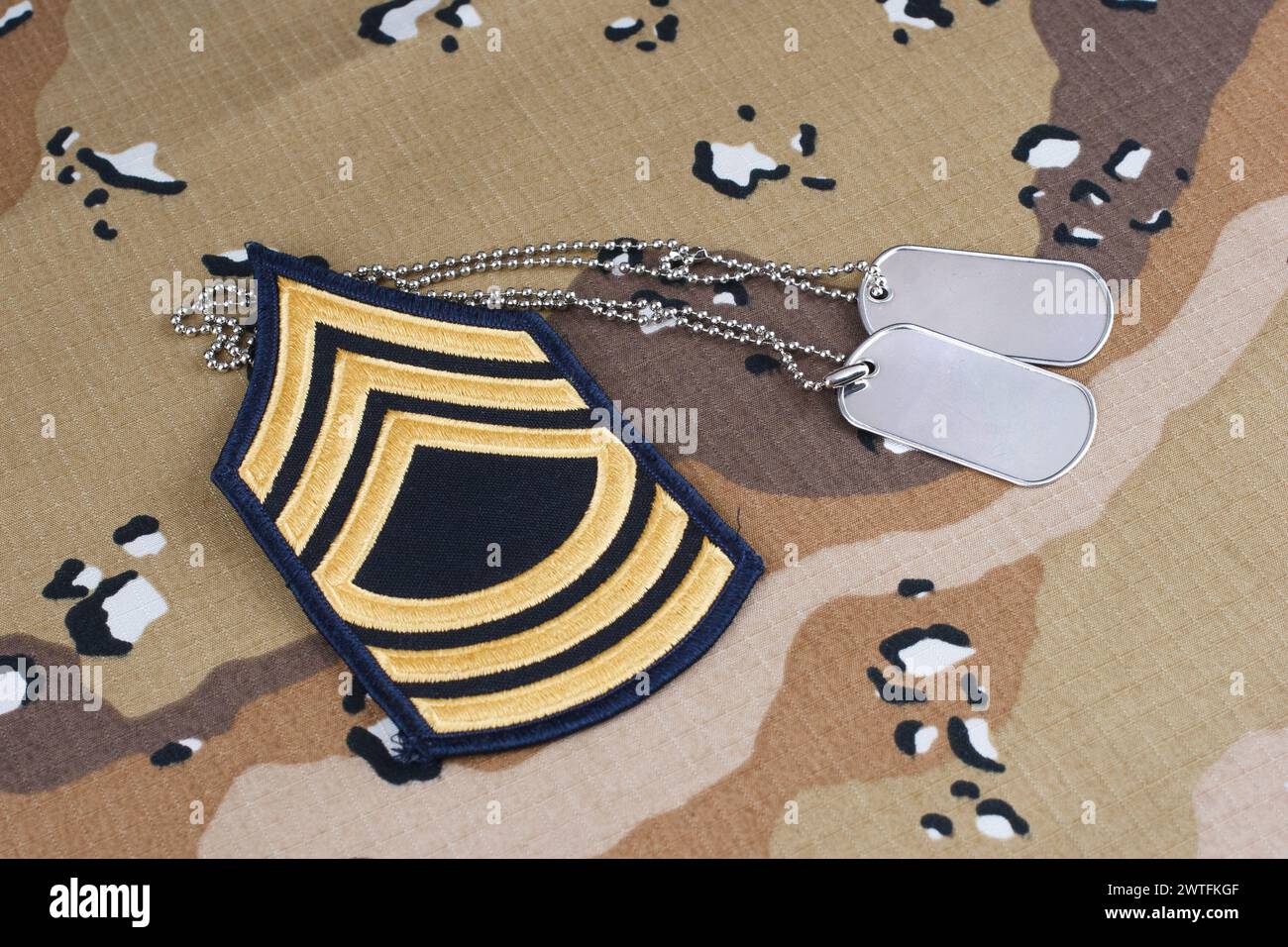 US ARMY Master Sergeant rank patch and dog tags on Desert Battle Dress ...
