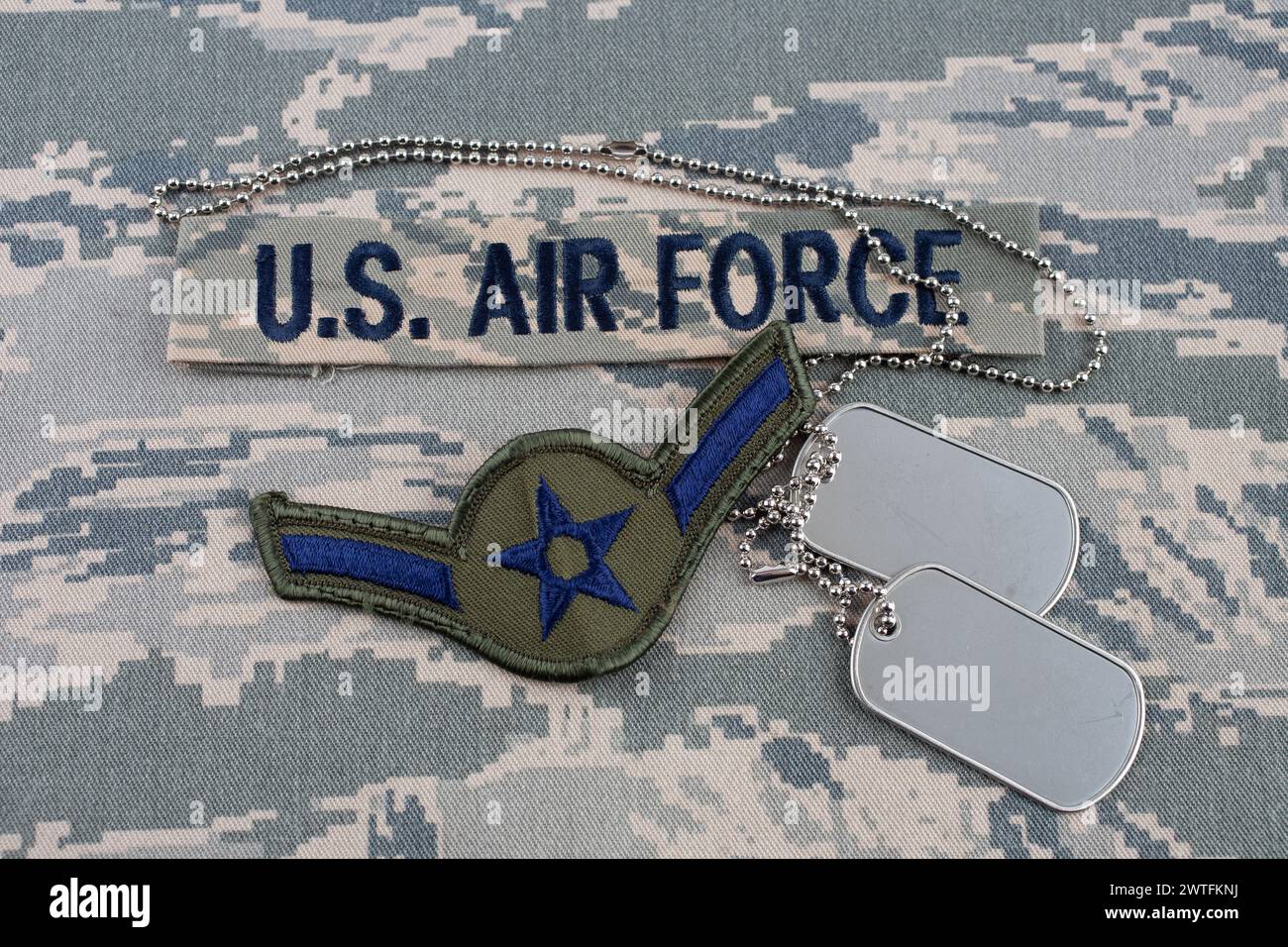 US AIR FORCE branch tape and Airman rank patch and dog tags on digital ...