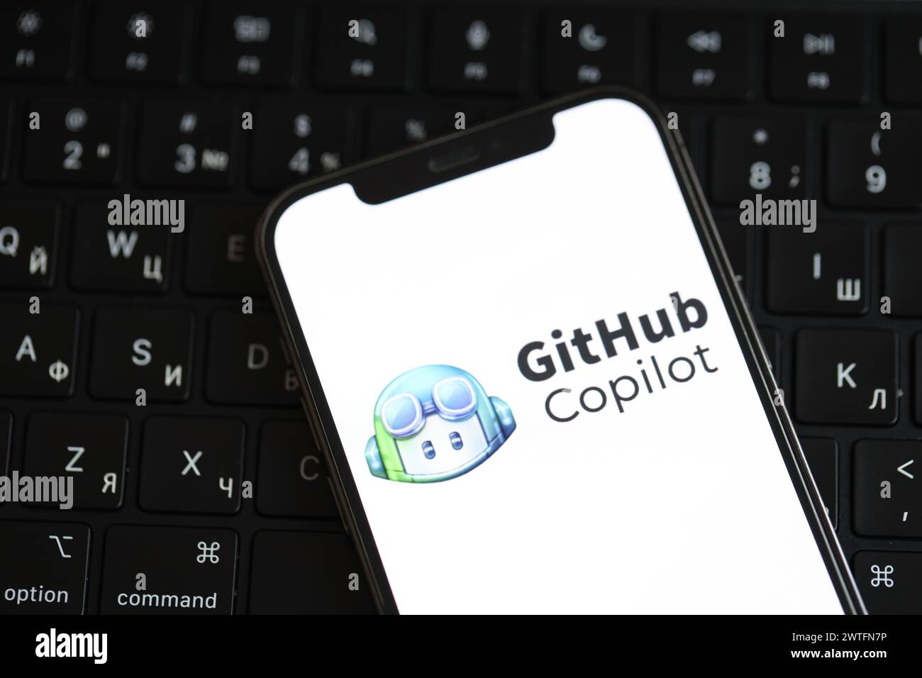 KYIV, UKRAINE - MARCH 17, 2024 Github copilot logo on iPhone display ...
