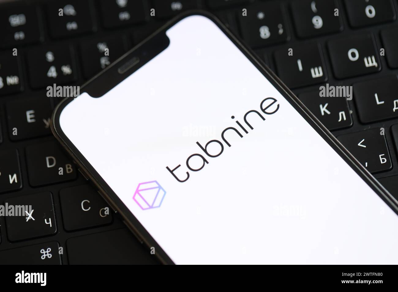 KYIV, UKRAINE - MARCH 17, 2024 Tabnine logo on iPhone display screen ...