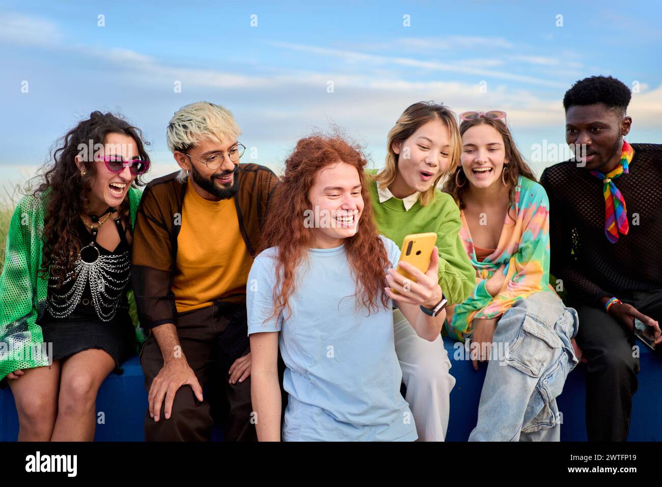 Group of young teenagers using cell phones. Concept of technology ...