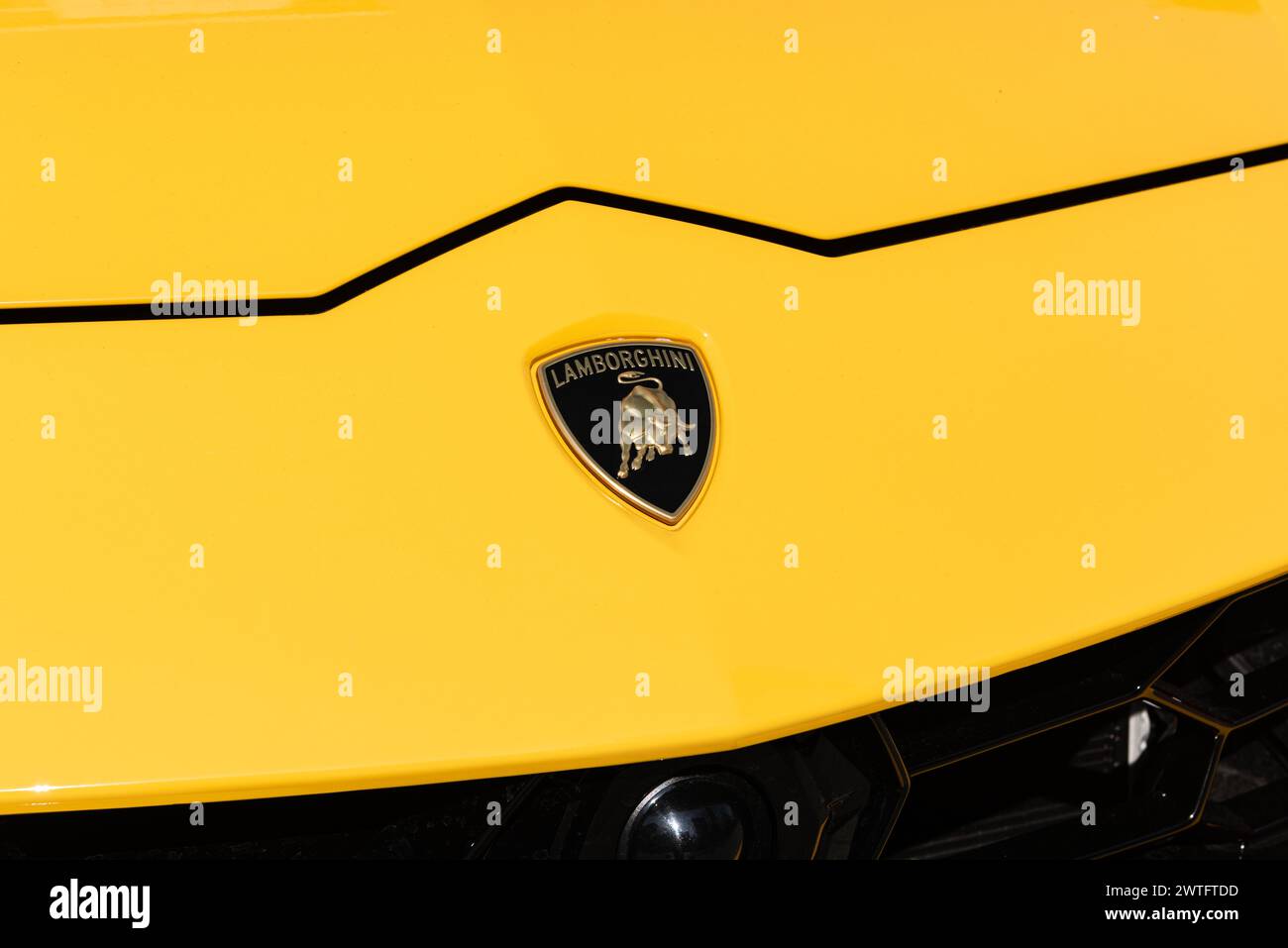ISTANBUL, TURKEY - MARCH 15, 2024: Lamborghini logo on a yellow car ...