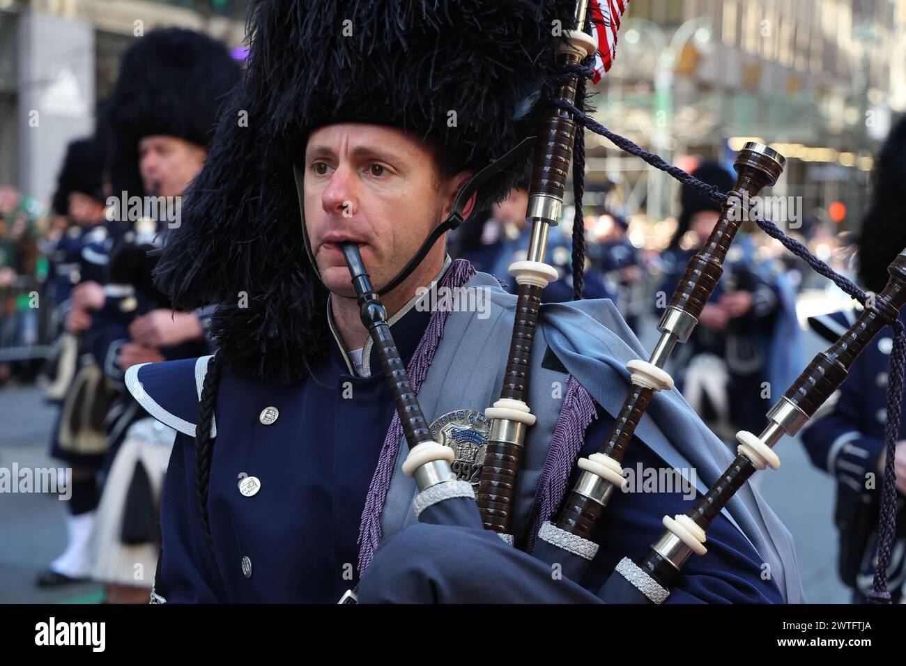 Members of the Bergen County Police Pipes and Drums perform during the ...